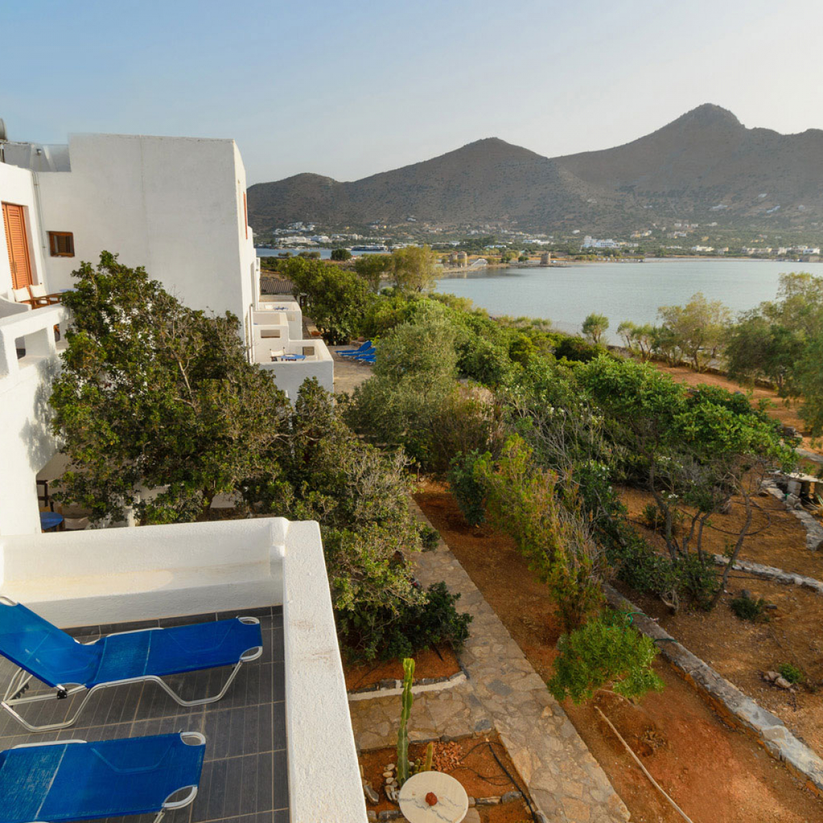 V2 | One bedroom | Upper floor veranda - Elounda Island Villas | Art ...